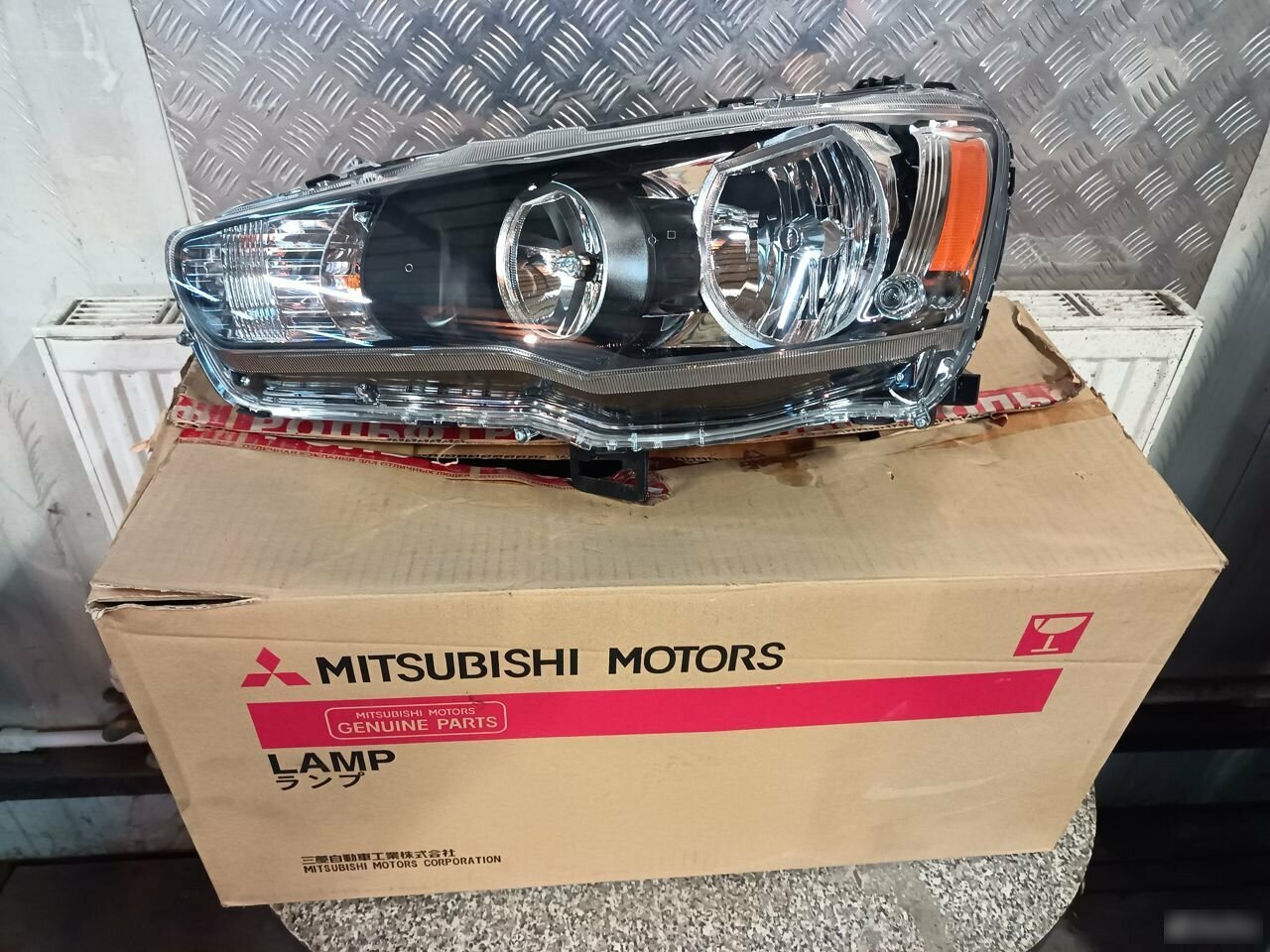 Фара левая Митцубиси Лансер 10 lancer X 2007-2010 8301A389