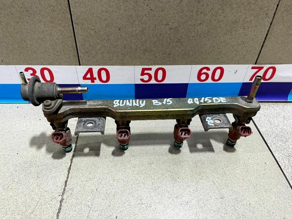 Форсунка топливная Nissan Sunny B15 166005L300