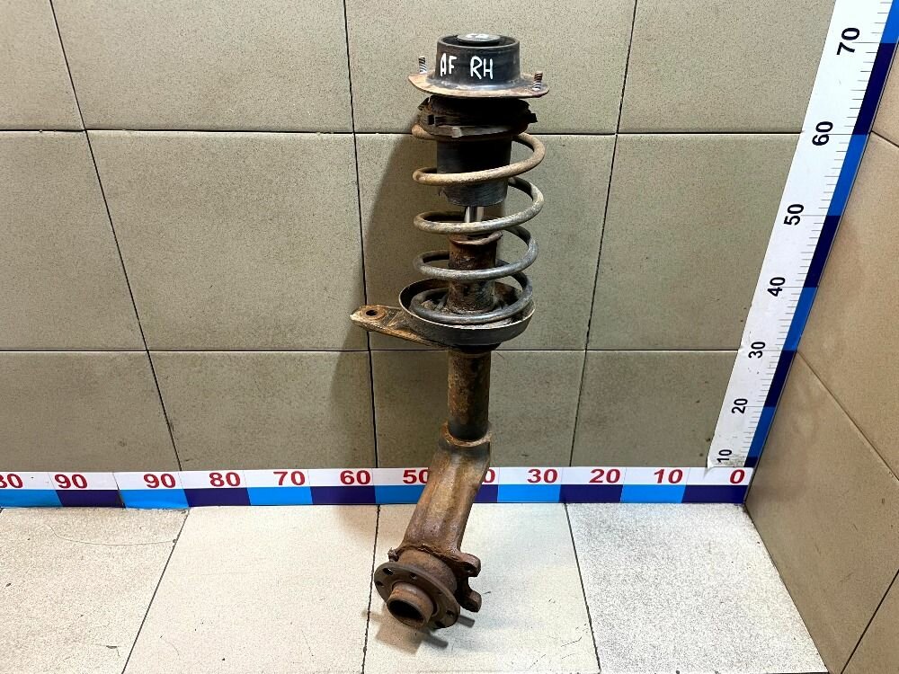 Стойка амортизатора переднего правого Opel Astra F