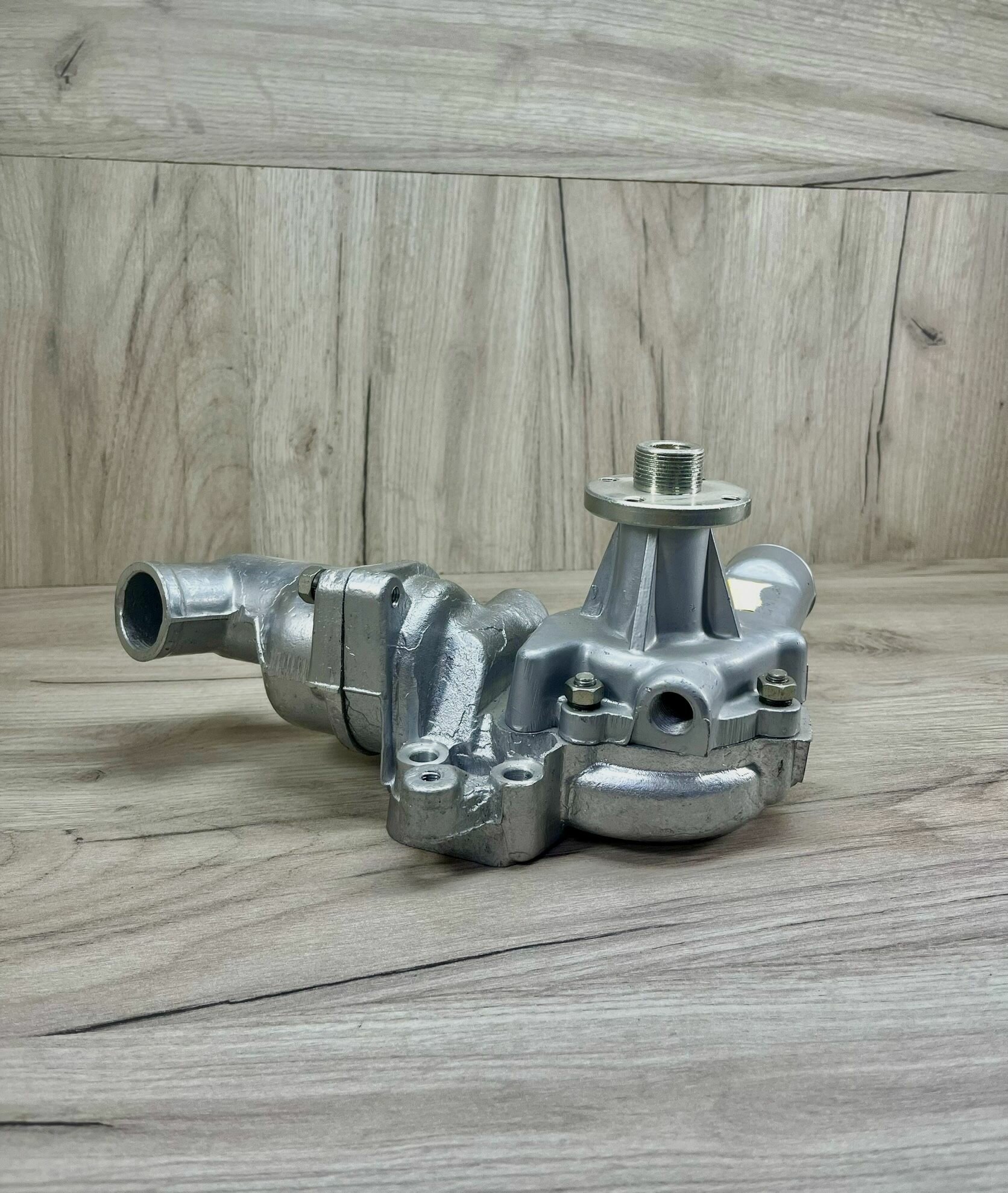 Насос водяной (помпа) в сборе с корпусом УМЗ 417 (90 л. с.) (Апогей / Ульяновск) арт. 451-1307100-04