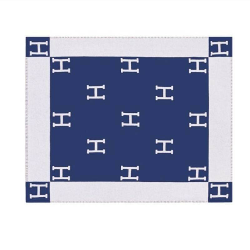 Soft flannel blanket with letter motif nordic inspired for home use and seasonal gift