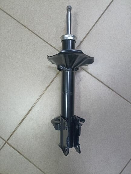 Амортизатор задний правый Tokico Nissan A1066