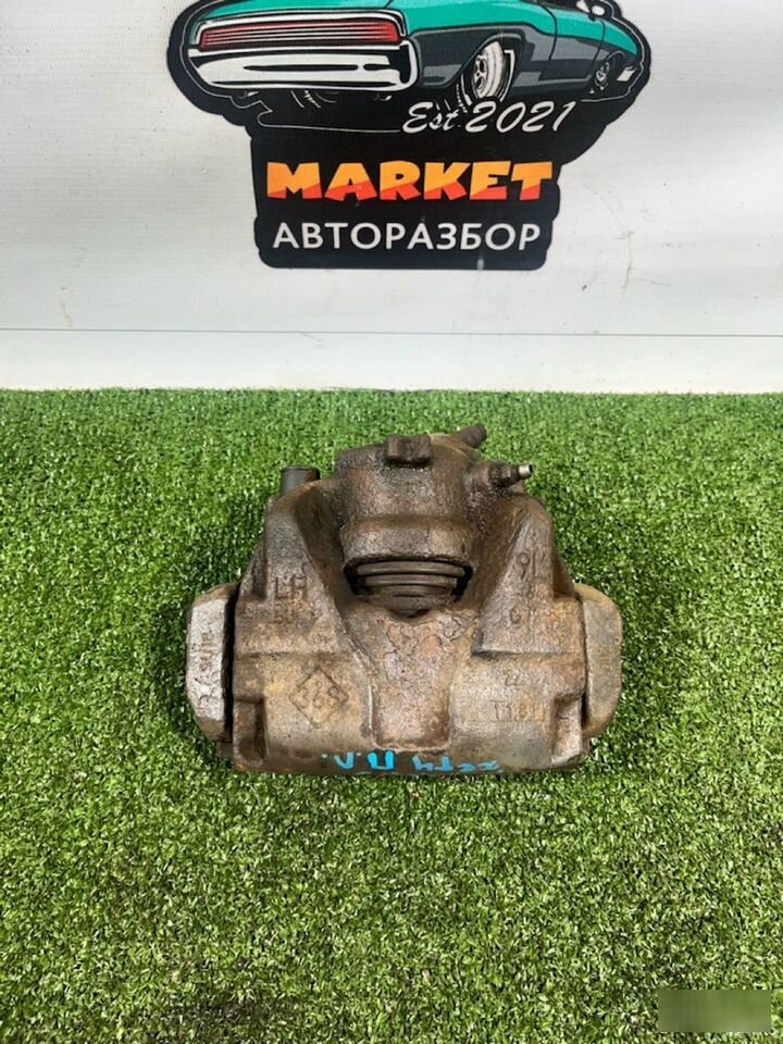 Суппорт тормозной передний левый Renault Megane 3