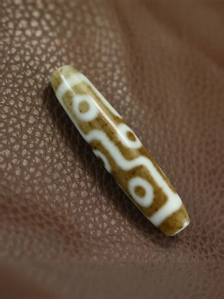 Бусина Дзи 9 глаза