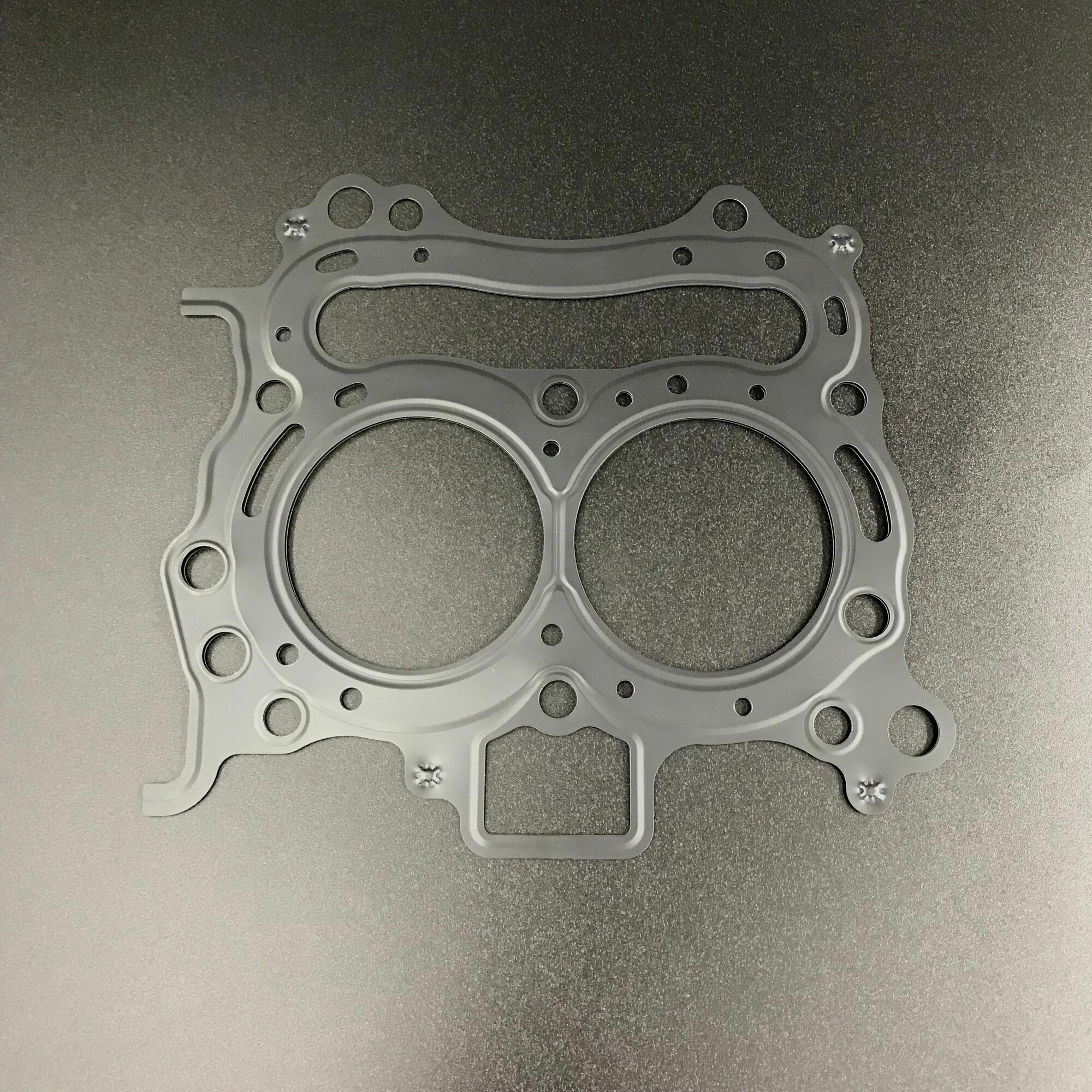 Прокладка под головку Suzuki DF9.9-15 (Suzuki)