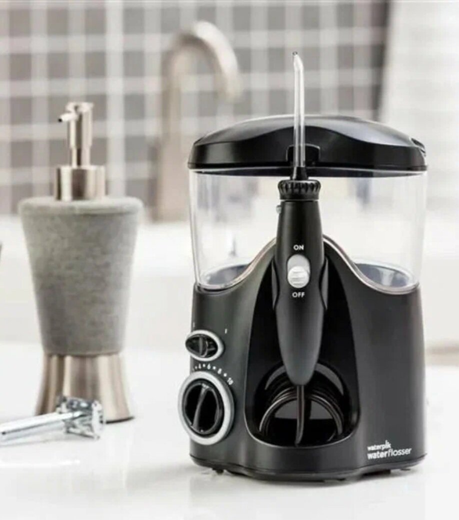 Ирригатор WaterPik WP-112 EU Ultra, черый, 10 режимов, 7 насадок