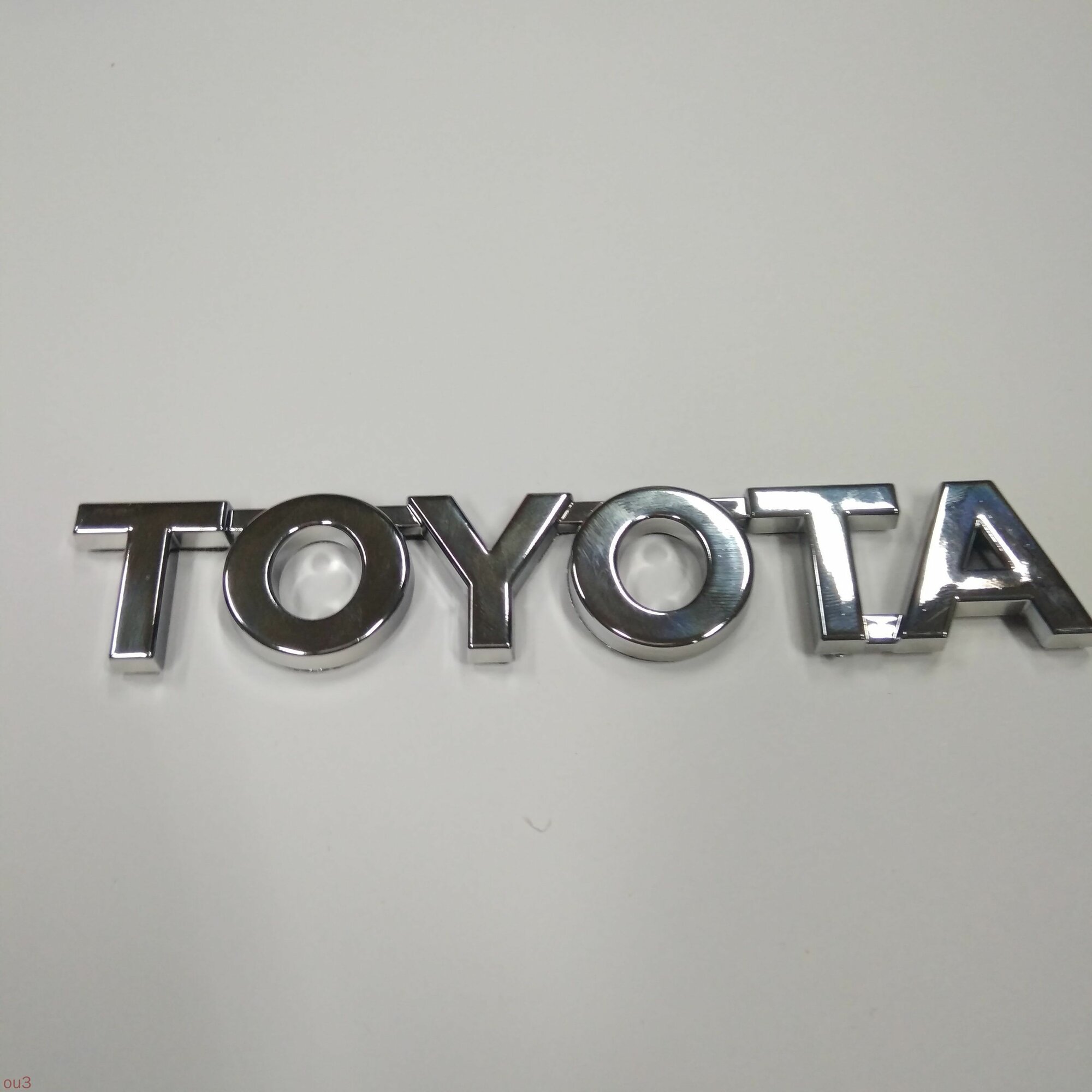 Шильдик TOYOTA 11,5 х 2 см серебристый