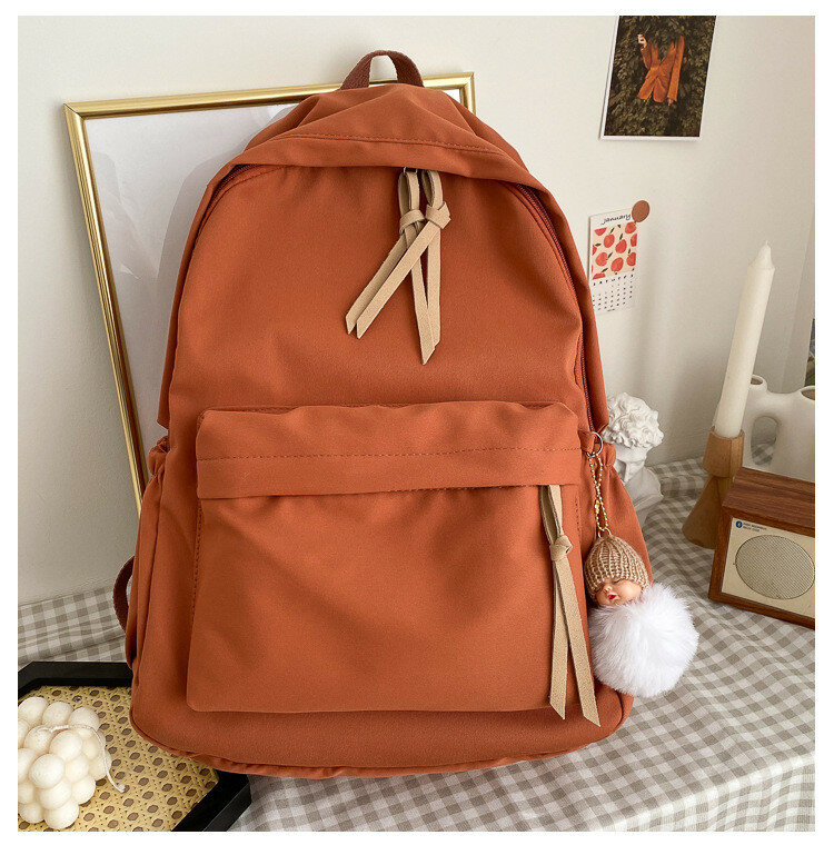 Fashion forward nylon backpack for college students with pouch and internal storage orange