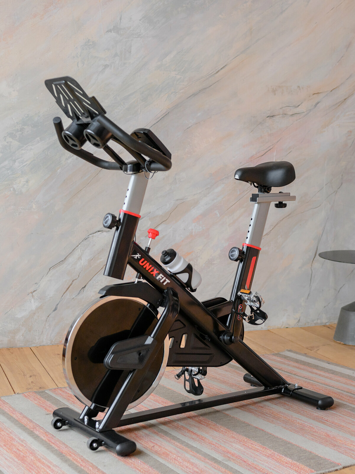 Велотренажер спин-байк UNIX Fit SB-490MAX для дома, колодочная система нагружения, маховик 15 кг (инерционный вес 24 кг)