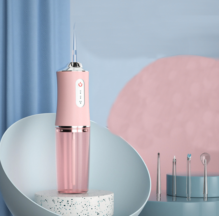 Ирригатор для чистки полости рта MyPads портативный, техника для чистки зубов, брекетов ирригатор с 4 насадками розовый практичный подарок