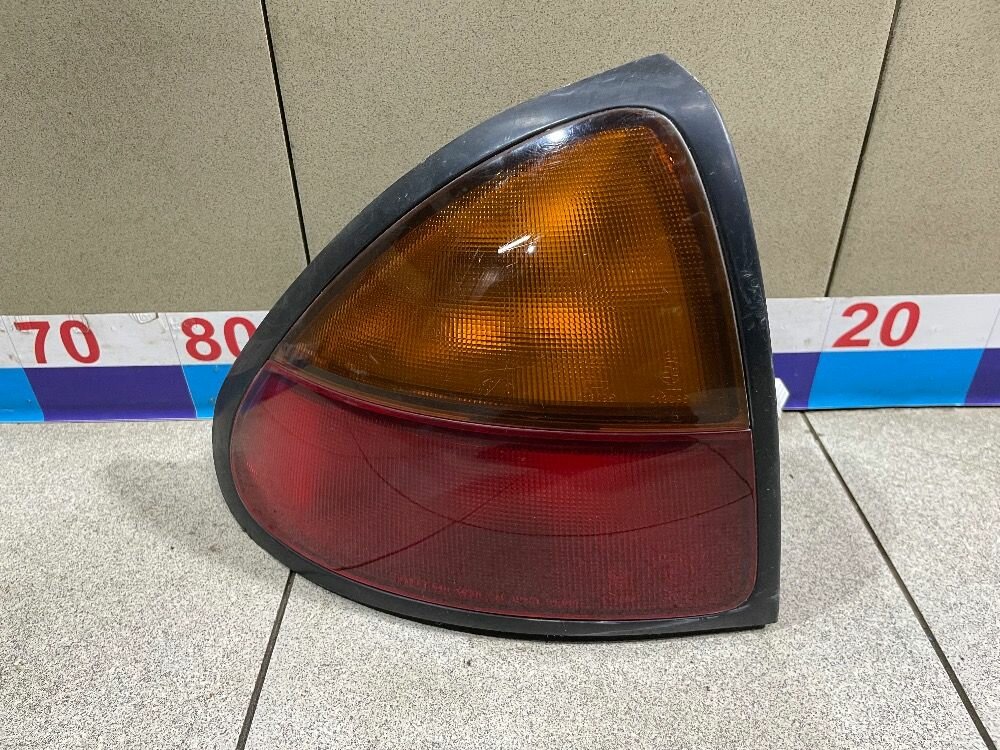 Фонарь задний левый Mazda 323 BA (1994—2000) B02S51160