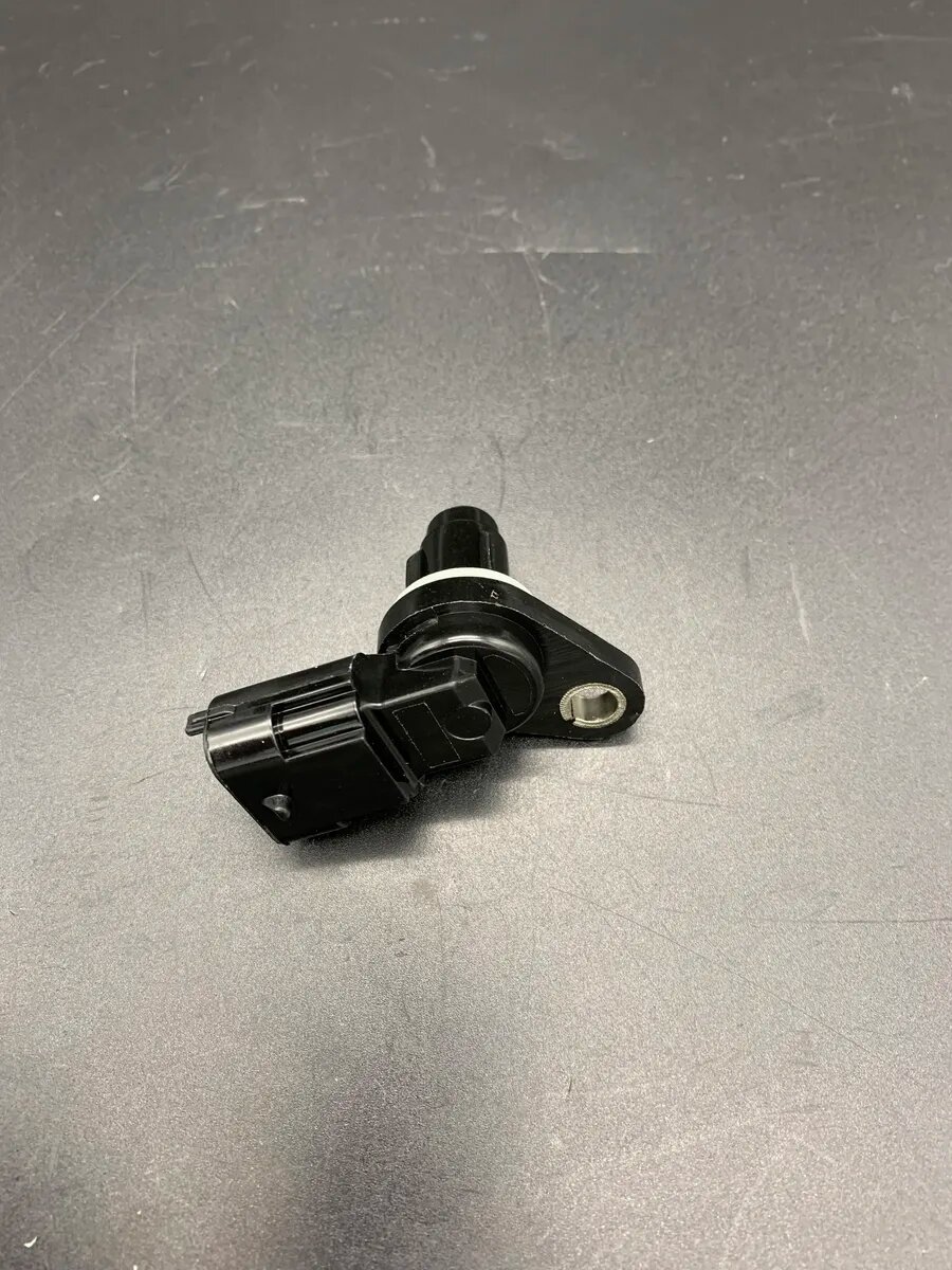 Датчик положения распредвала Новое