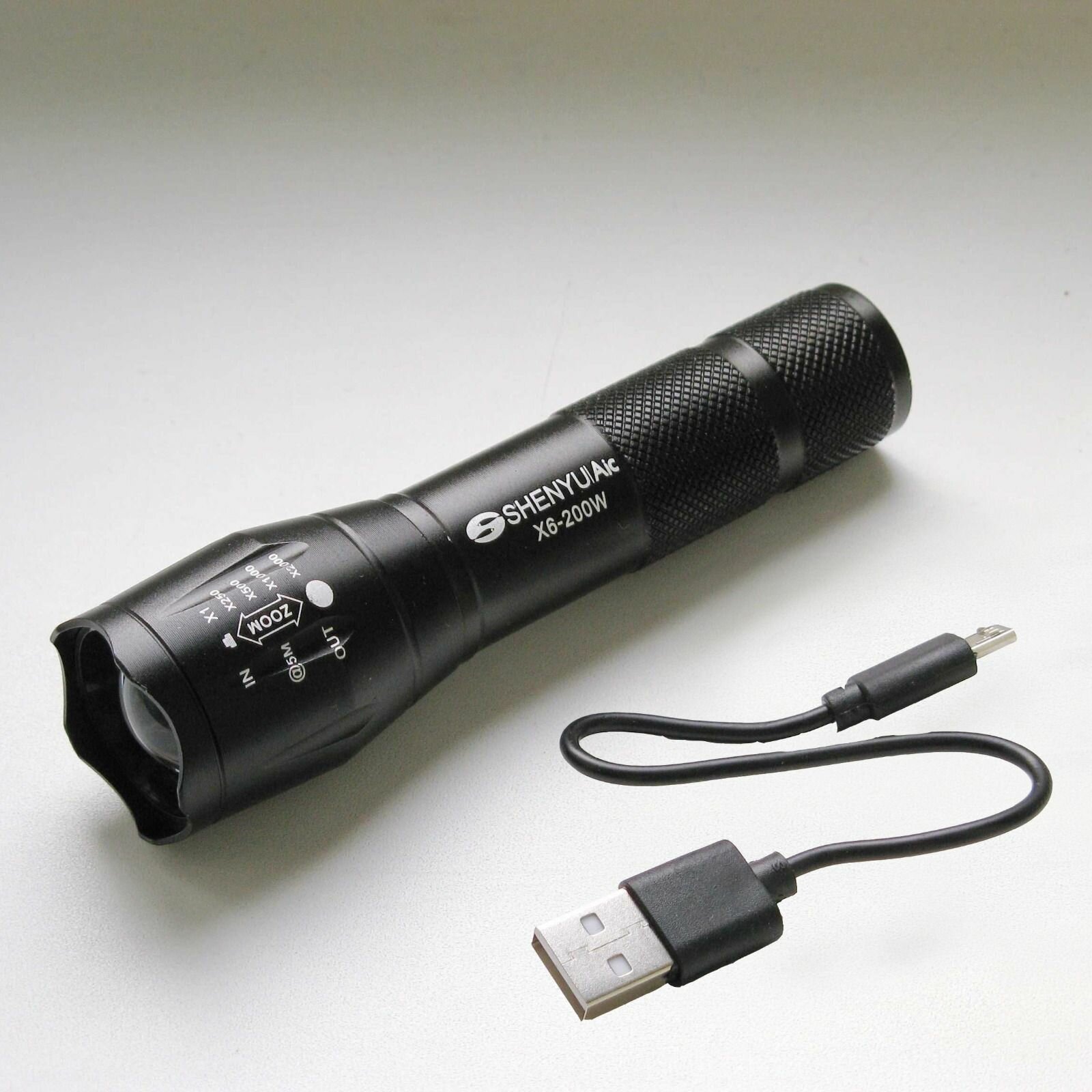 Фонарь ручной светодиодный аккумуляторный Shenyu Aic x6-200W