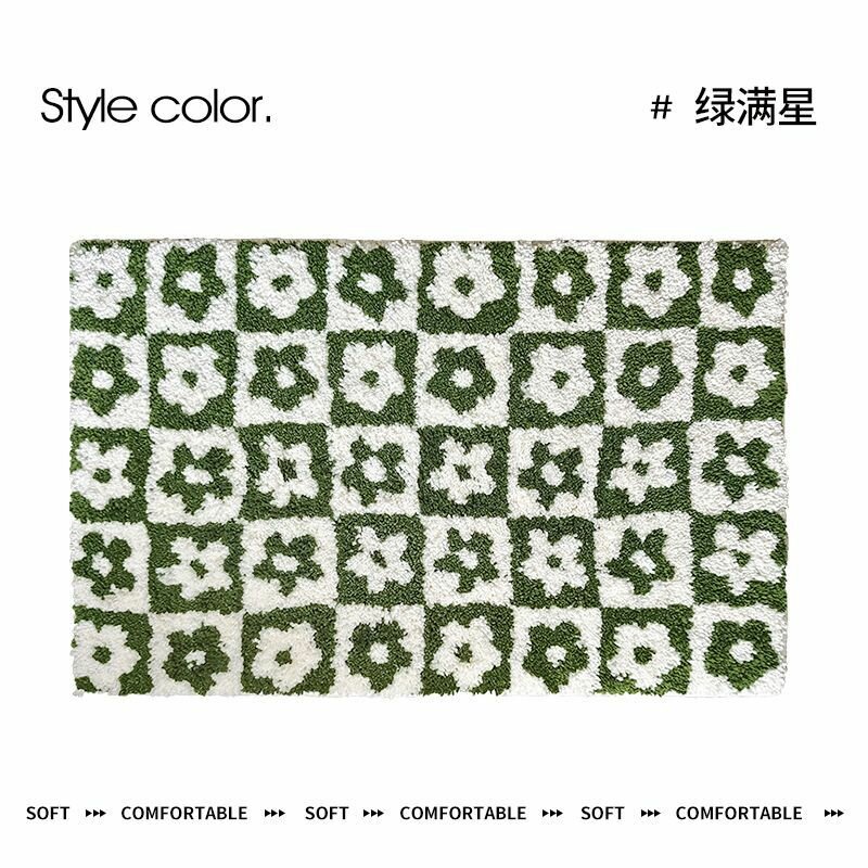 Этот стильный коврик для ванной из искусственного кашемира в черно-белую клетку отлично впитывает влагу и быстро сохнет.