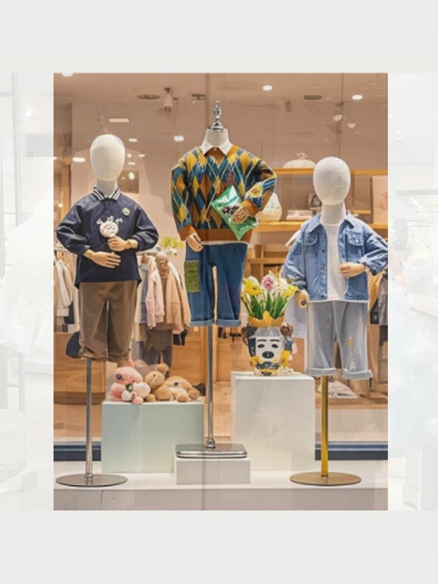 Детские манекены-половинки (витринные подставки для одежды), манекены для детской одежды (мальчиков и девочек), полуторсы для витрин магазинов.