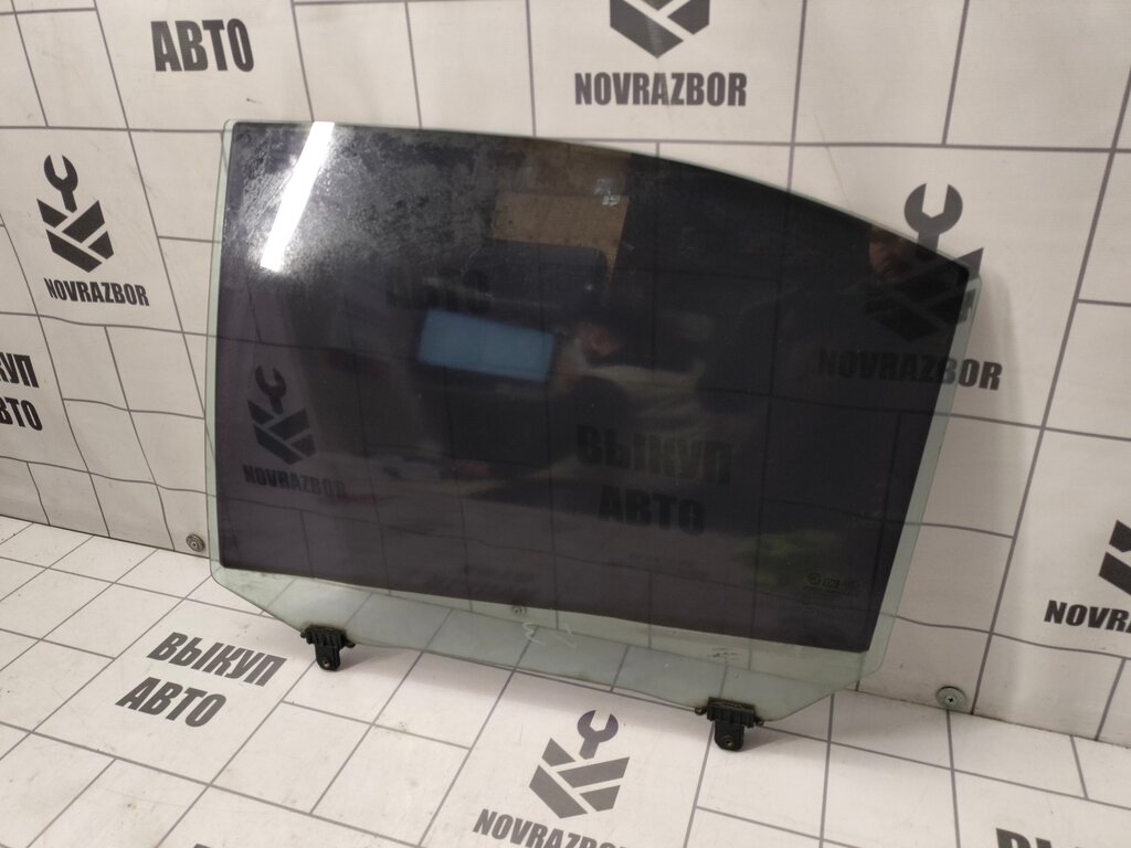Стекло двери задней левой Hyundai Elantra 3 00-05
