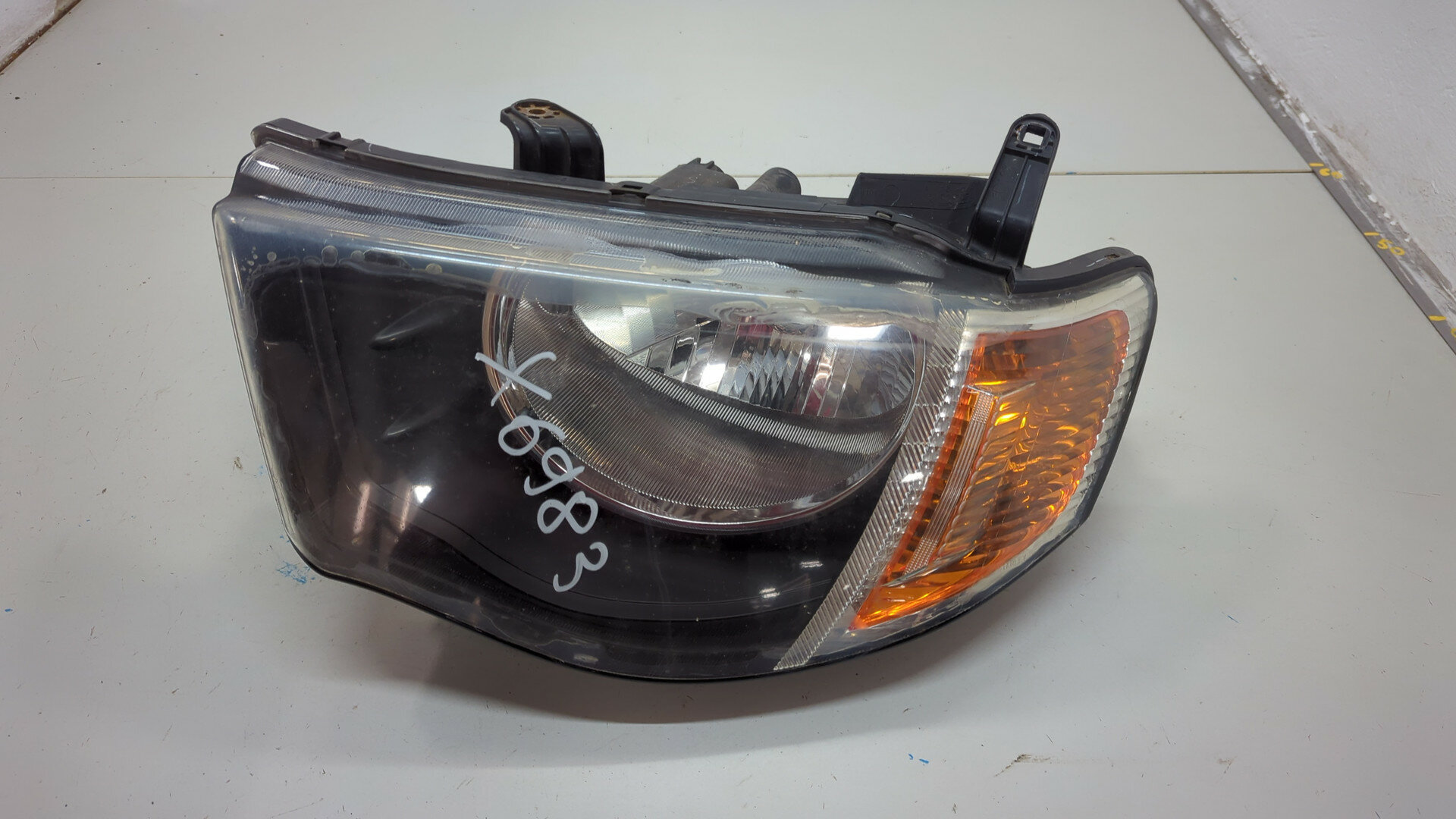 Фара (передняя) левая Mitsubishi L200 Б/У