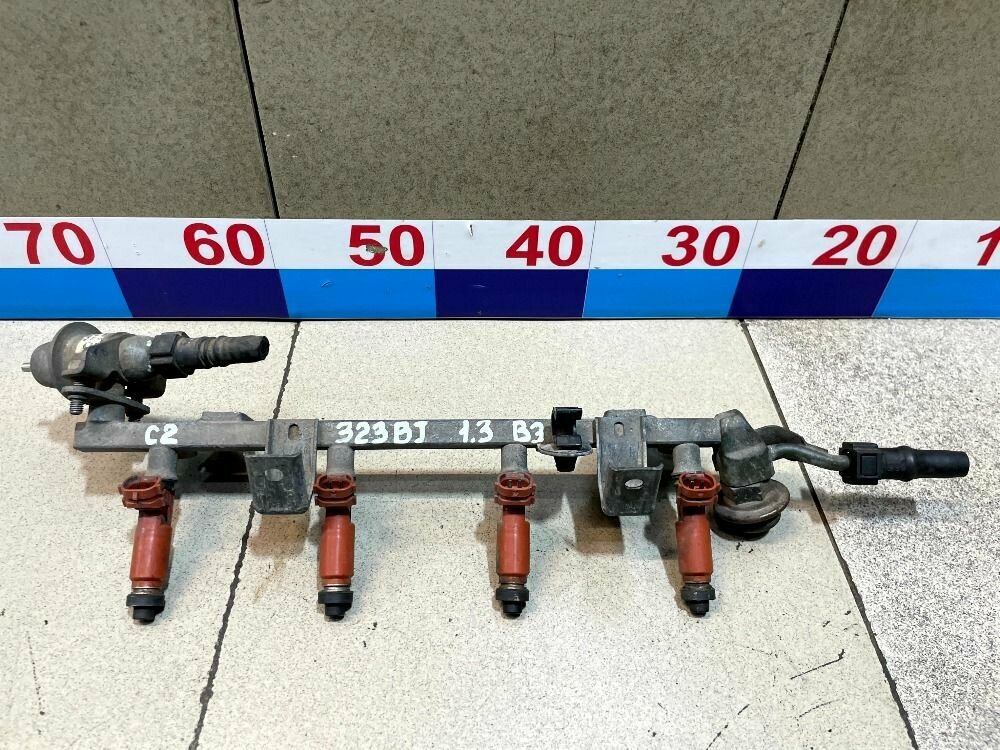 Форсунка топливная Mazda 323 BJ