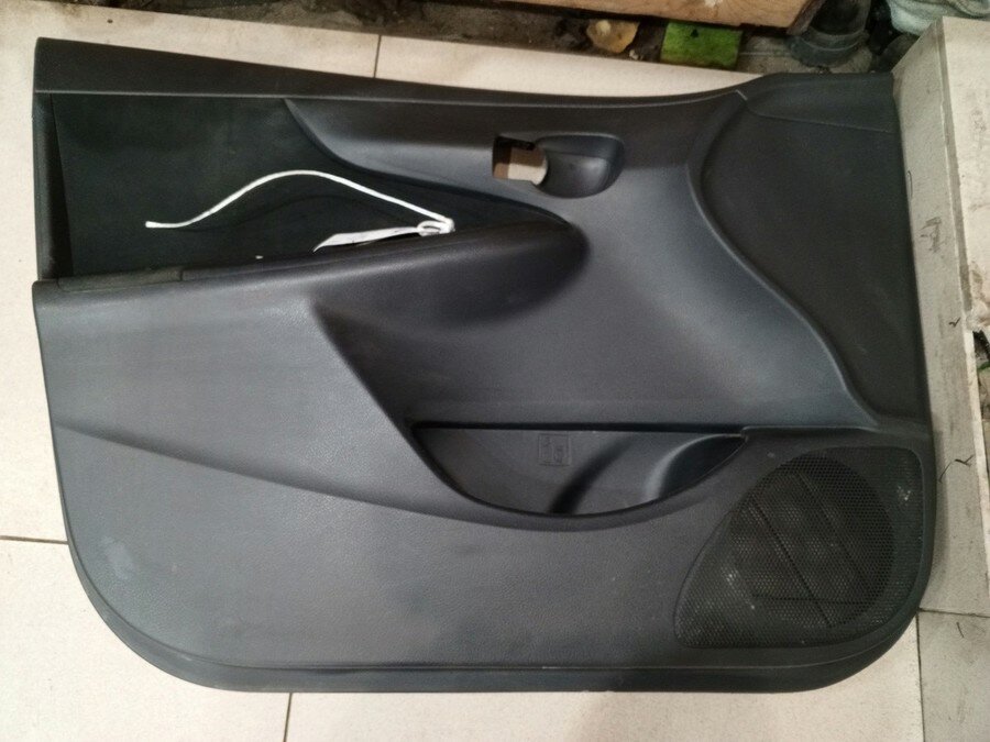 Обшивка двери передней левой от Toyota Corolla E150 2006-2013