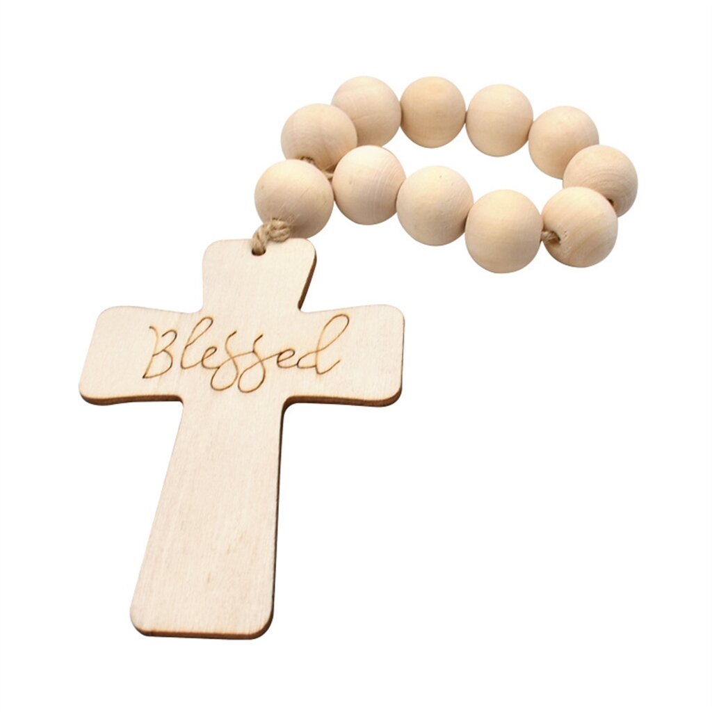 Подвеска из деревянных бусин в виде креста