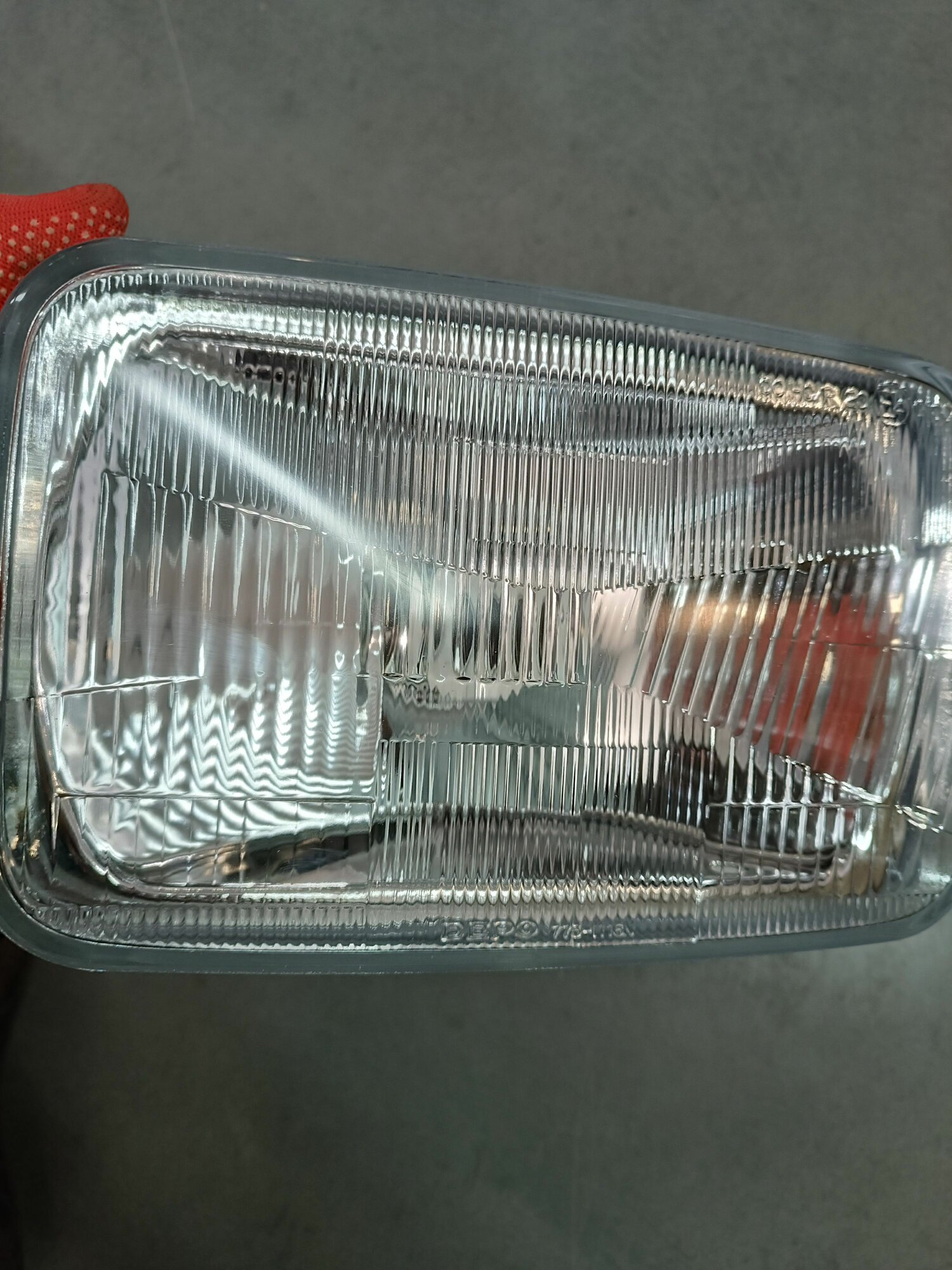 Фара головного света Volvo FH12/16, FM12 , арт. 7731116NLDE DEPO