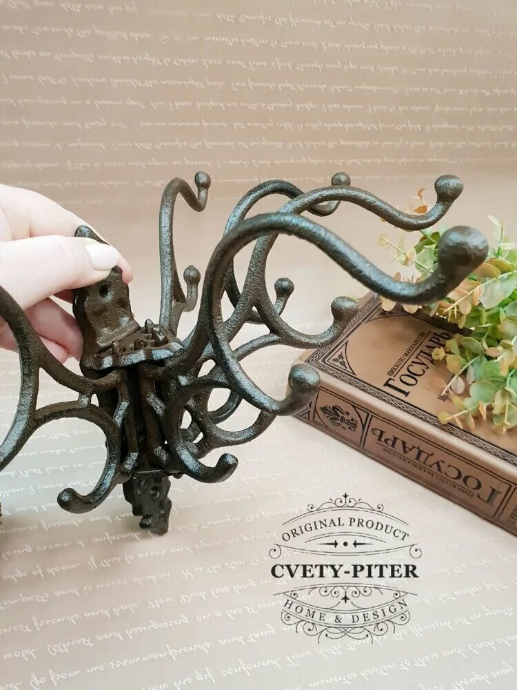 Вешалка чугунная поворотная на пять крючков