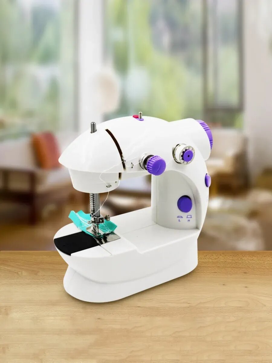 Электрическая швейная машинка