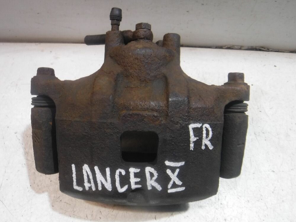 Суппорт передний правый Mitsubishi Lancer X 4605A476