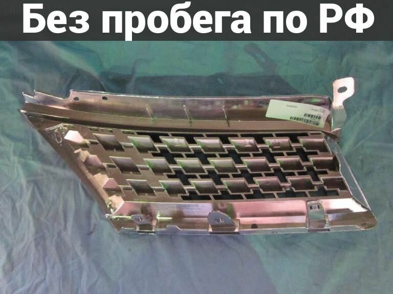 Решетка радиатора с пробегом Nissan Tiida C11
