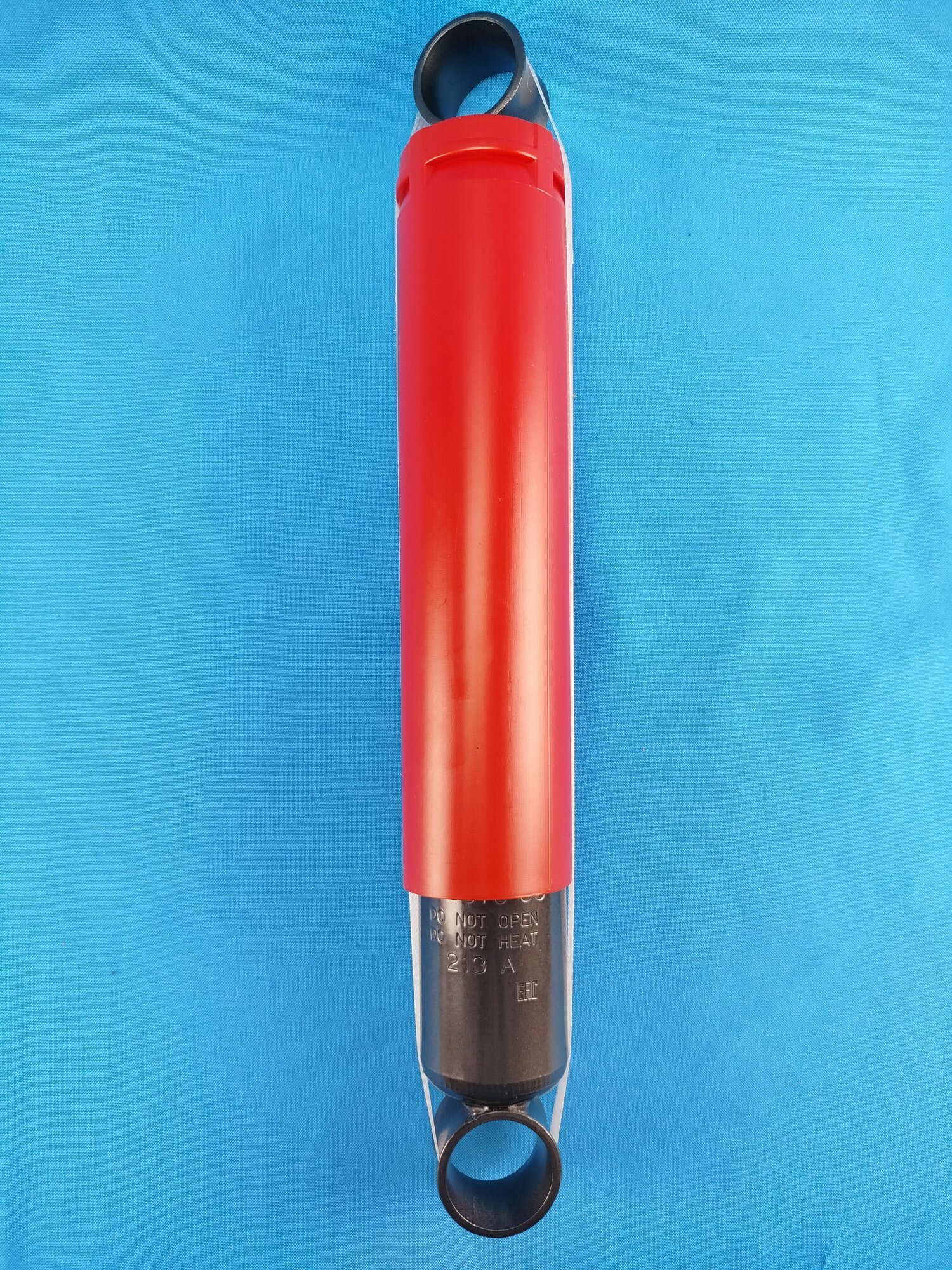 Амортизатор "FENOX" для автомобилей УАЗ 2206, 3303, 3741, 3909, 3962 газовый (пласт. кожух)