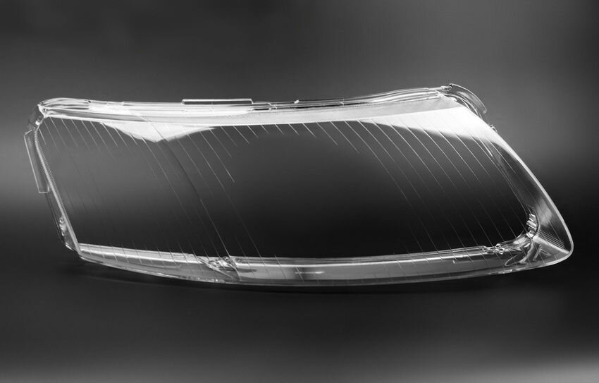 Стекло фары для Audi A6 C6 (2004-2011), левое, поликарбонат