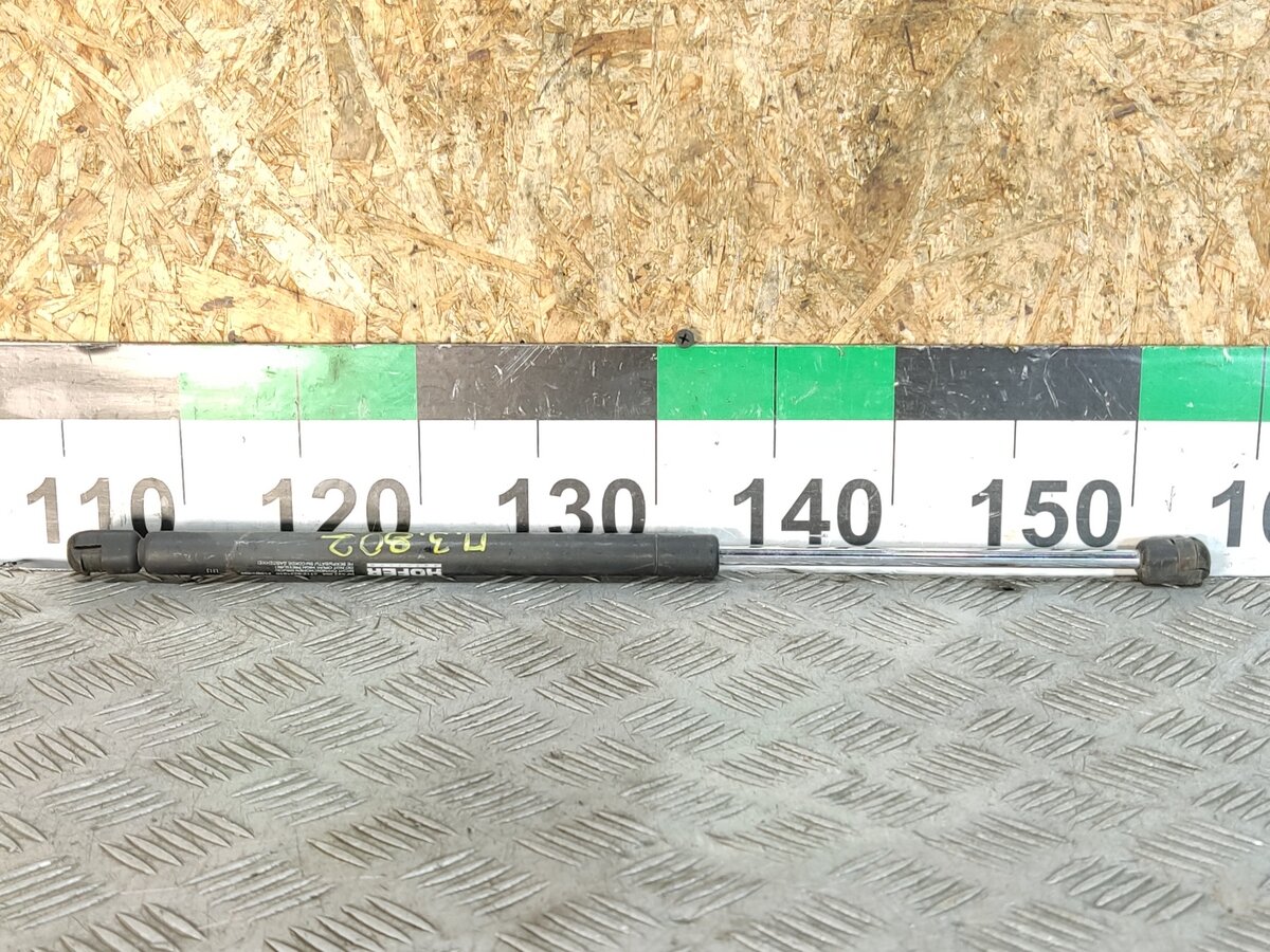 Амортизатор двери багажника VAZ 2112 21128231010