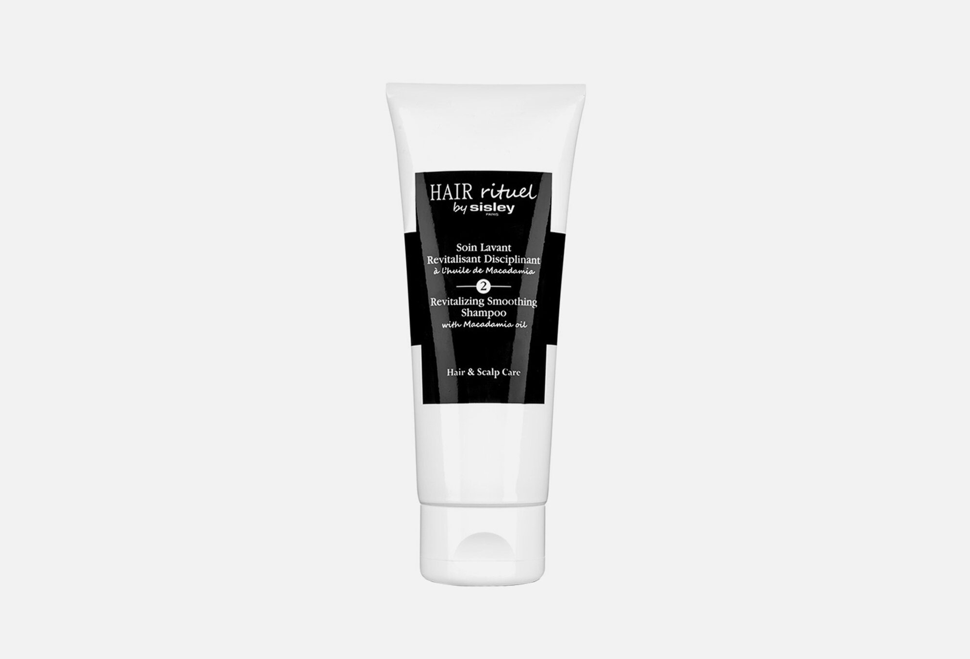 Шампунь для волос с маслом макадамии HAIR RITUEL BY SISLEY Revitalizing Smoothing Shampoo with Macadamia oil 200 мл