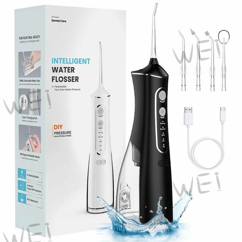 Ирригатор для полости рта портативный , 4 насадок черный / Ирригатор для зубов / Прибор для чистки зубов