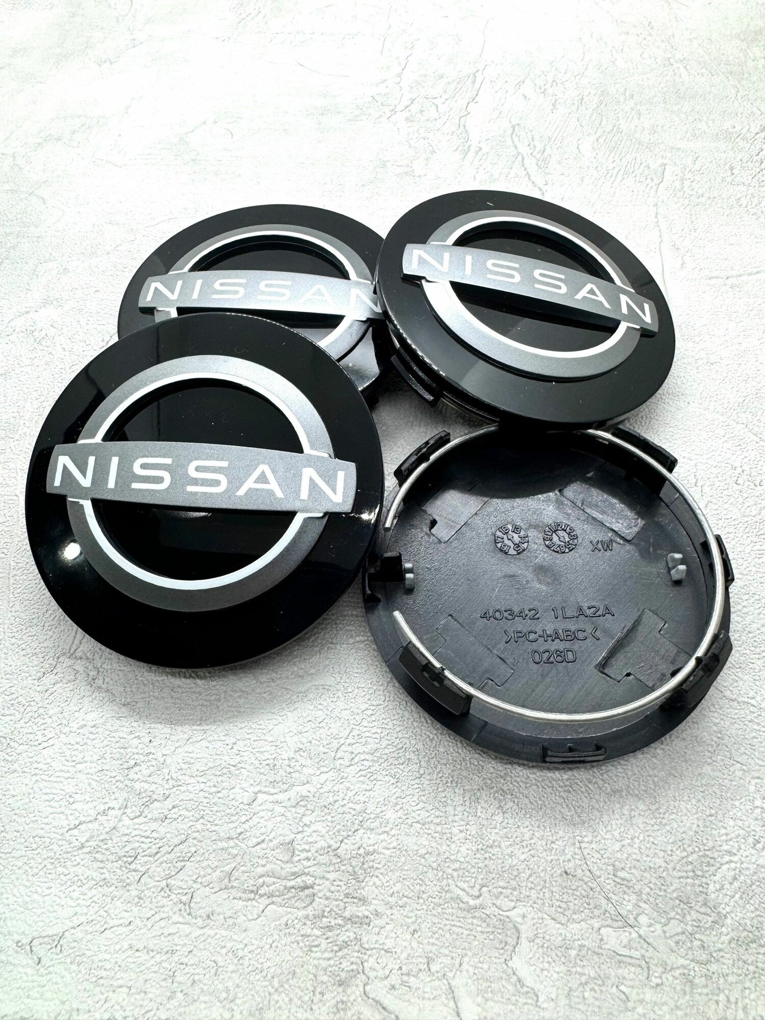 Колпачки заглушки на литые диски для Ниссан / Nissan Patrol 85/77/15мм (40342-1LA2A) 4 штуки.