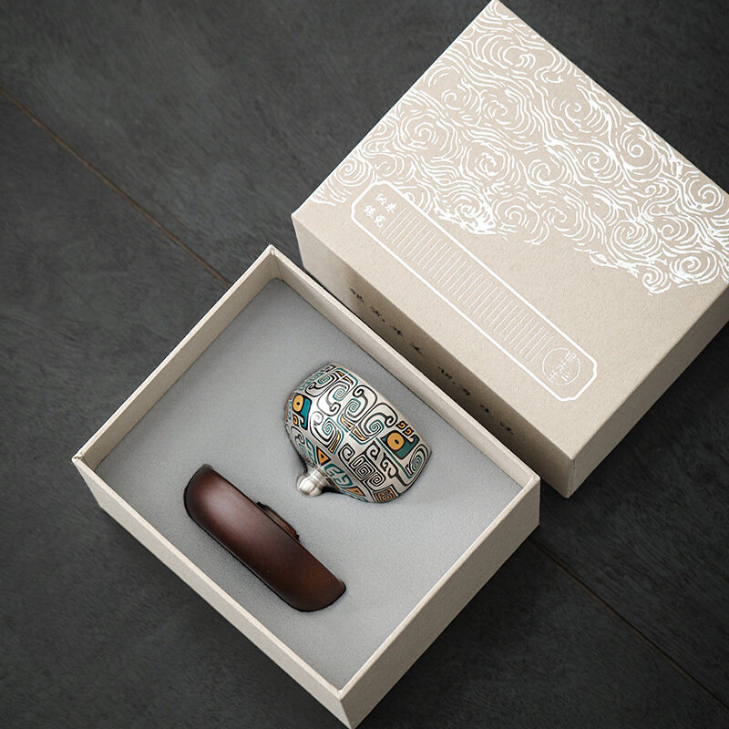 Поворачивающаяся фарфоровая чашка с покрытием серебра «Поворот удачи»