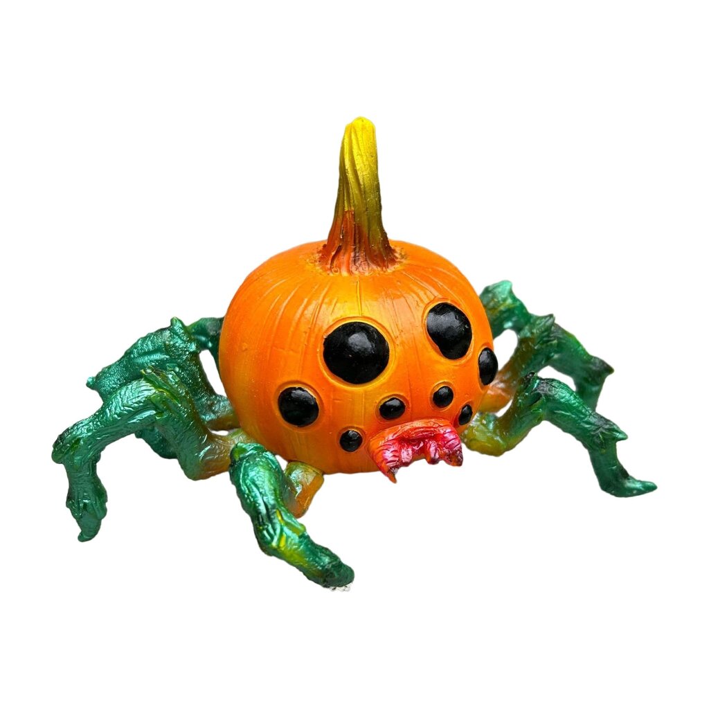Яркая фигурка пауков из тыквы для украшения школы и офиса