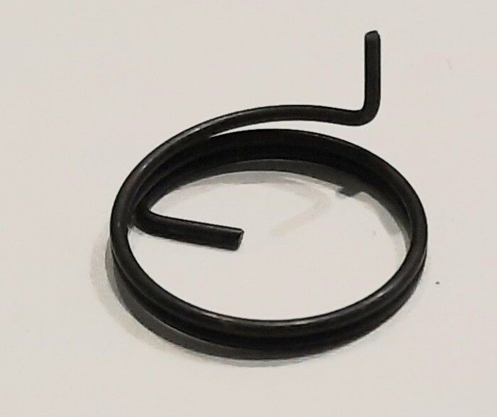 Пружина пилкодержателя для лобзика Интерскол МП-100/700Э, 120/750Э, 65/550Э, 85/600Э