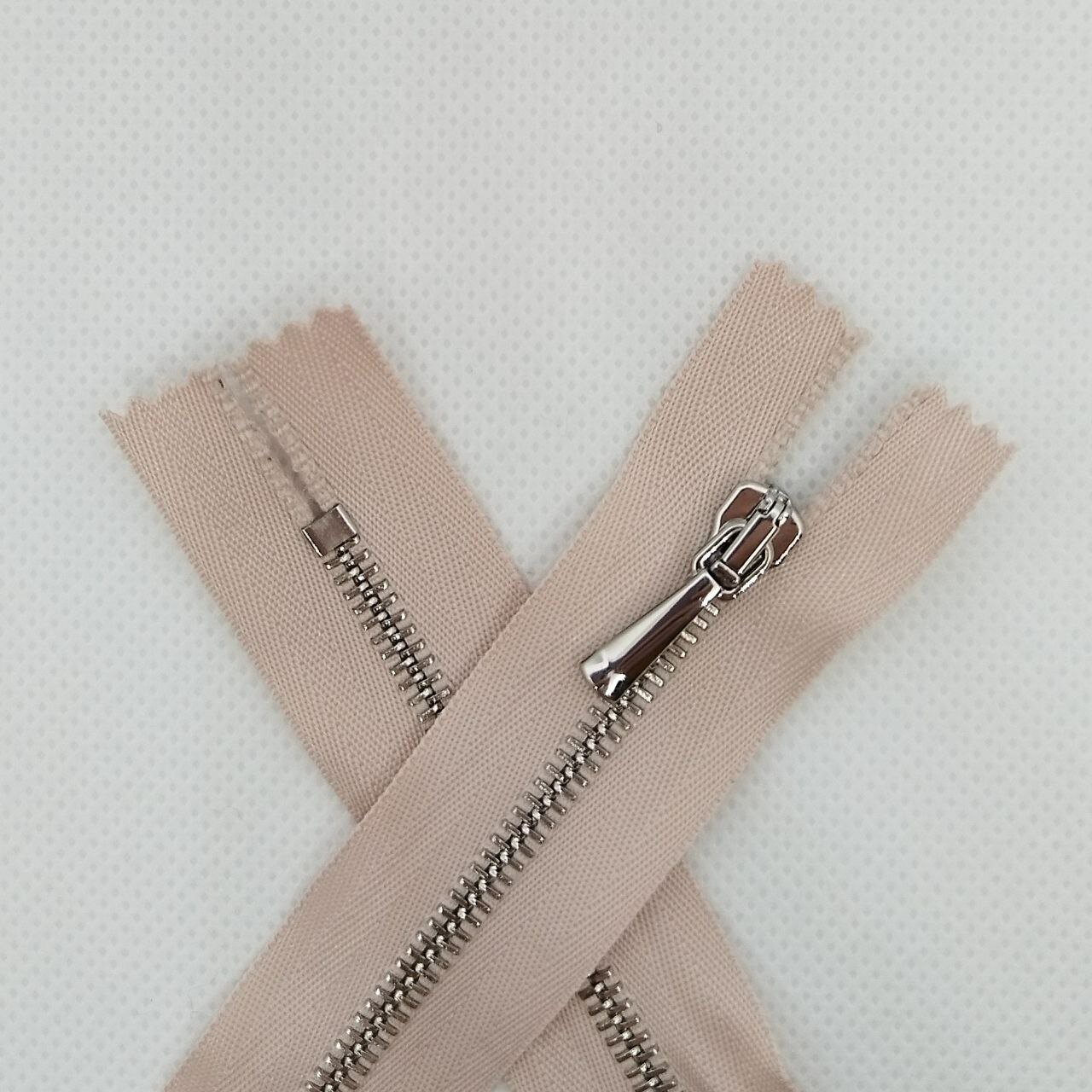 Молния металлическая светло-розовая неразъемная №2 16 см