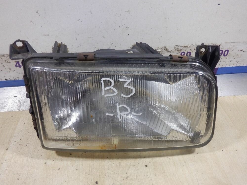 Фара правая VW Passat B3 357941018