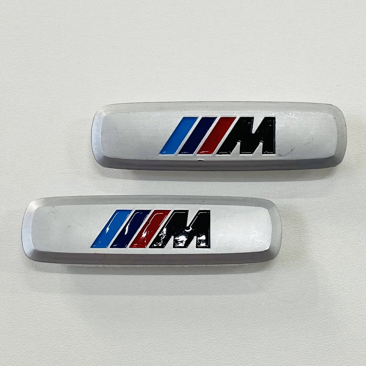 Шильдик BMW - M (2 шт.) / логотип для EVA-ковриков