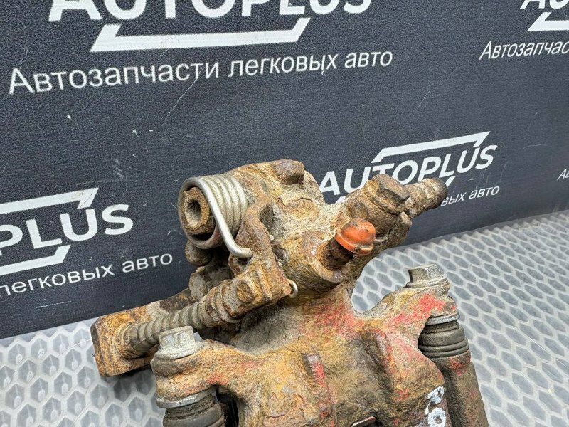 Суппорт тормозной Левый Задний Rover 400 1996 (1.6 16K4F) Б/У с пробегом Арт. 21575 — фото 1