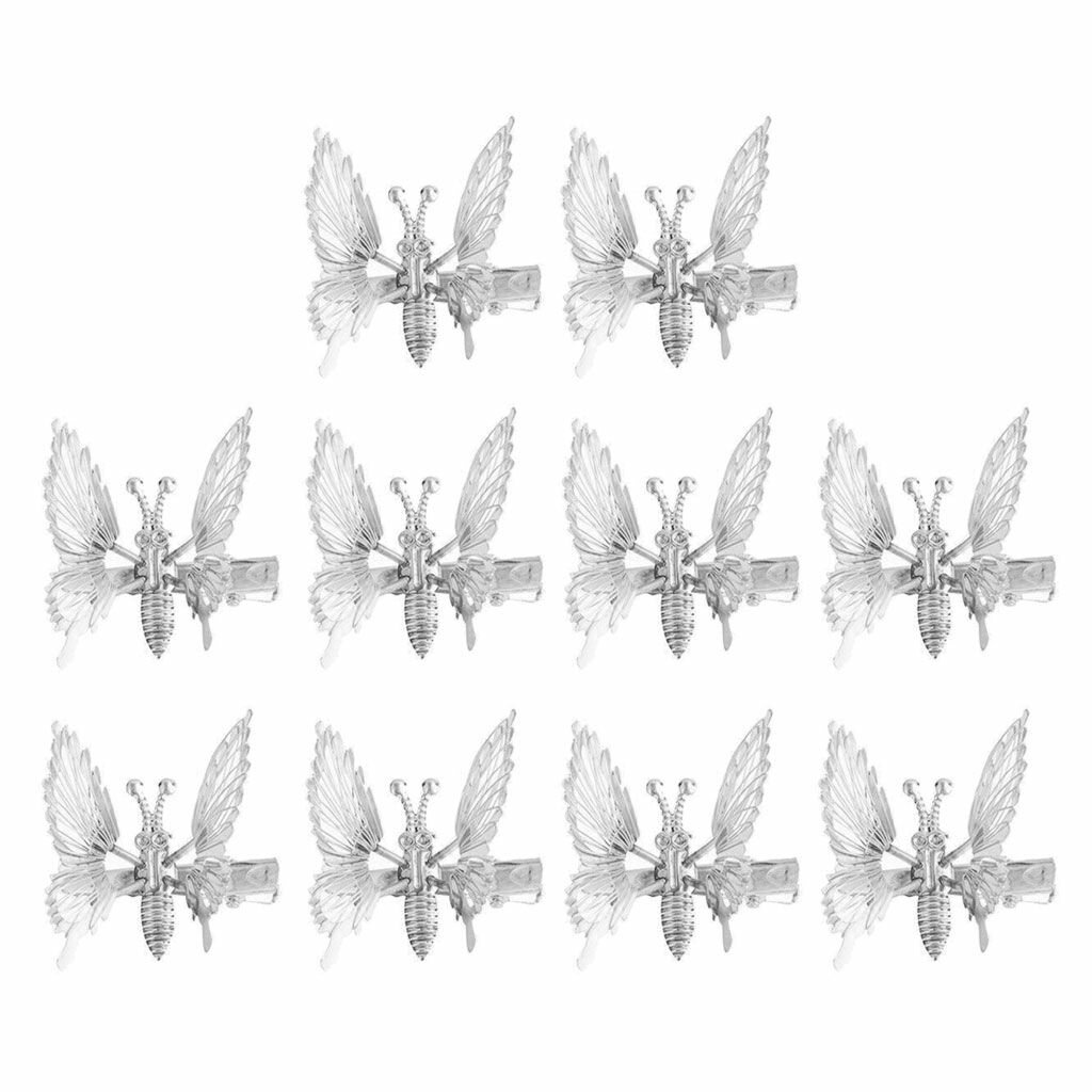 10 заколок в виде движущихся бабочек- серебристых