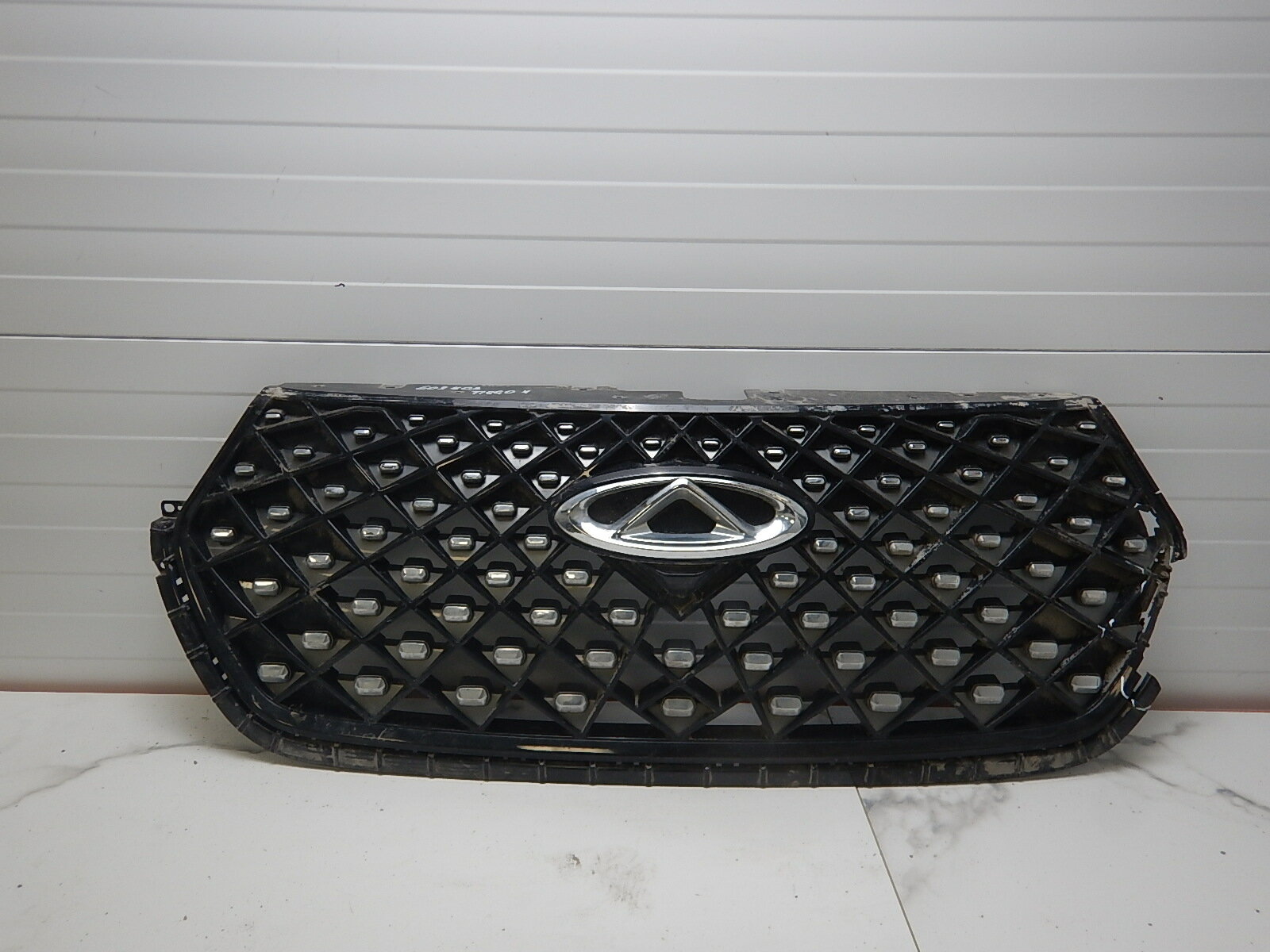 Б/У Решетка радиатора, Chery (Чери)-TIGGO 4 (17-) Chery TIGGO 4 (17-) Трещины,нет куска. 602403 CHERY арт. 602001797AA