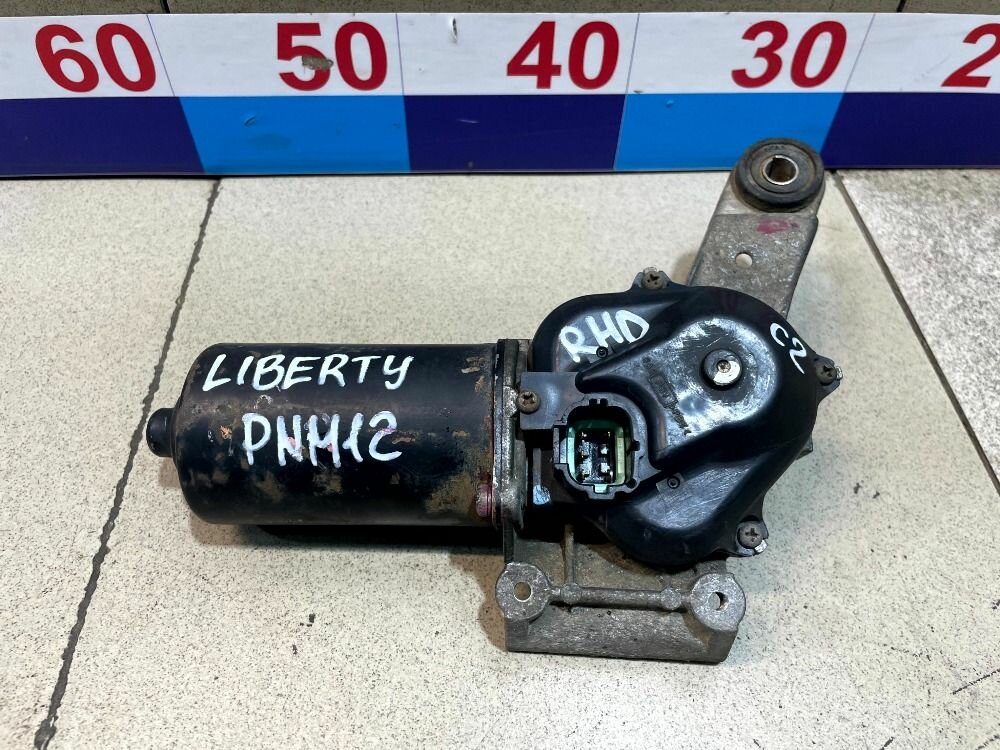 Моторчик стеклоочистителя передний Nissan Liberty 28810WF100