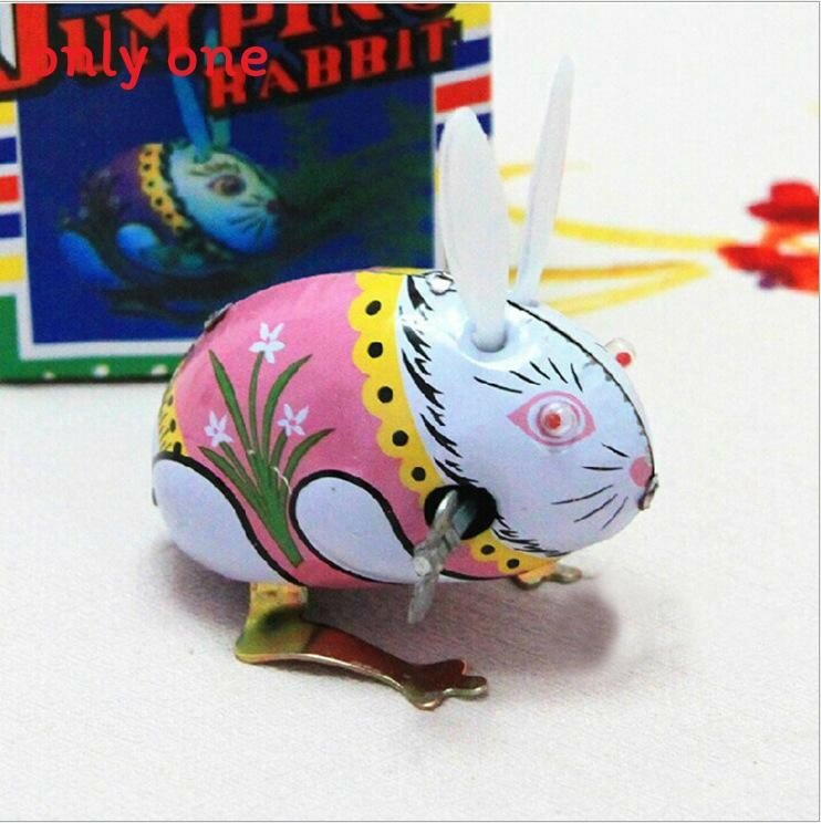 Engaging metal jumping frog toy with vintage charm perfect for kids of all ages