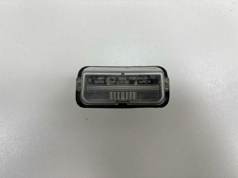 Фонарь подсветки номера Toyota Corolla E180 2013