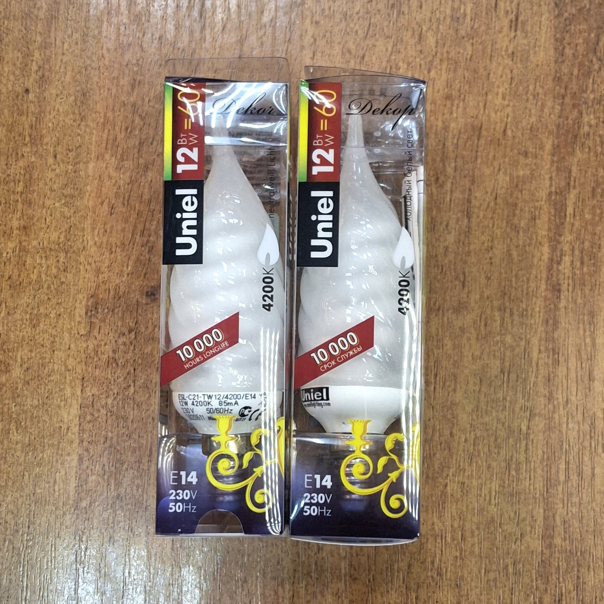 Энергосберегающая лампа Uniel 12W 4200K E14 свеча на ветру витая (4 штуки)