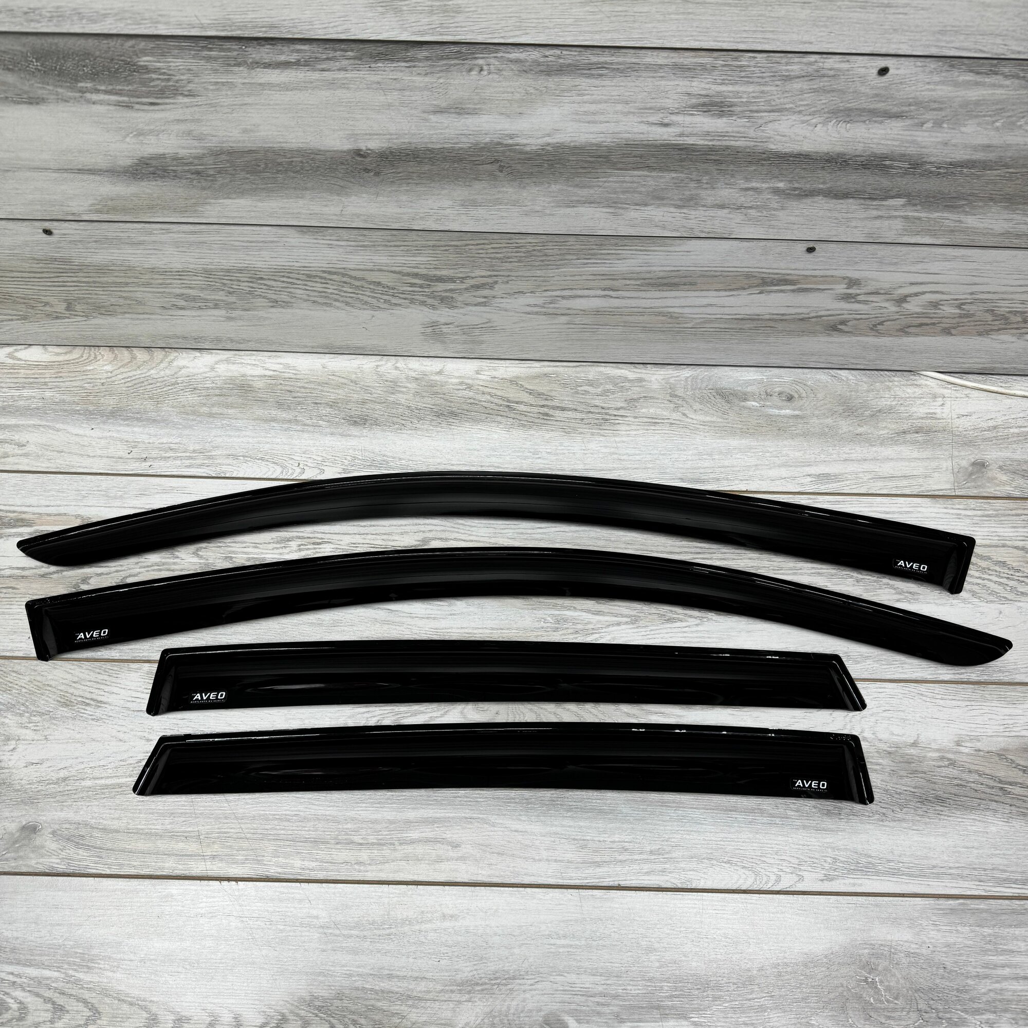 Дефлекторы (ветровики) окон на Chevrolet Aveo 2003-2008 хэтчбек (Шевроле Авео)