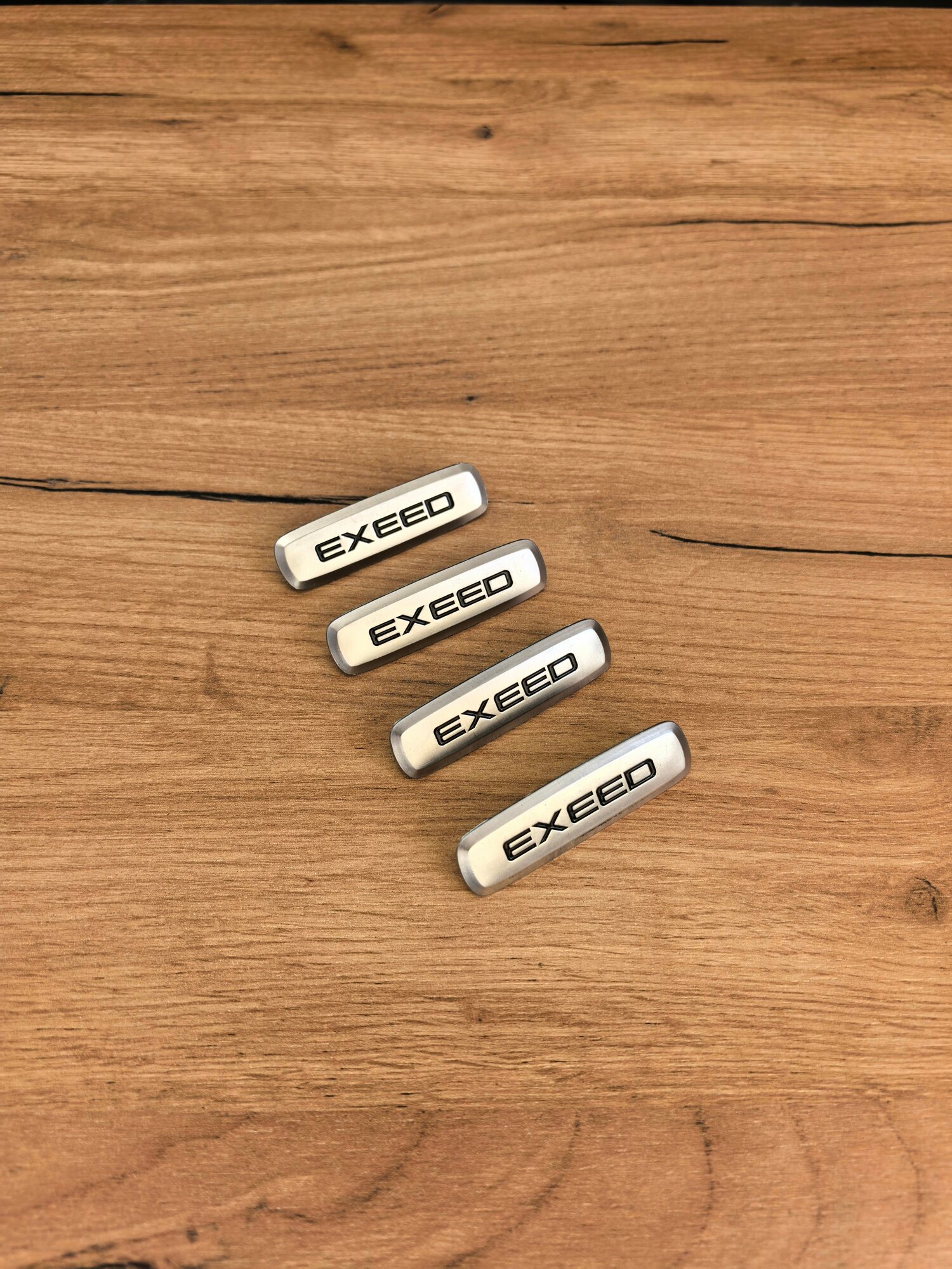 Шильдики Exeed (эмблема, логотип) Эксид